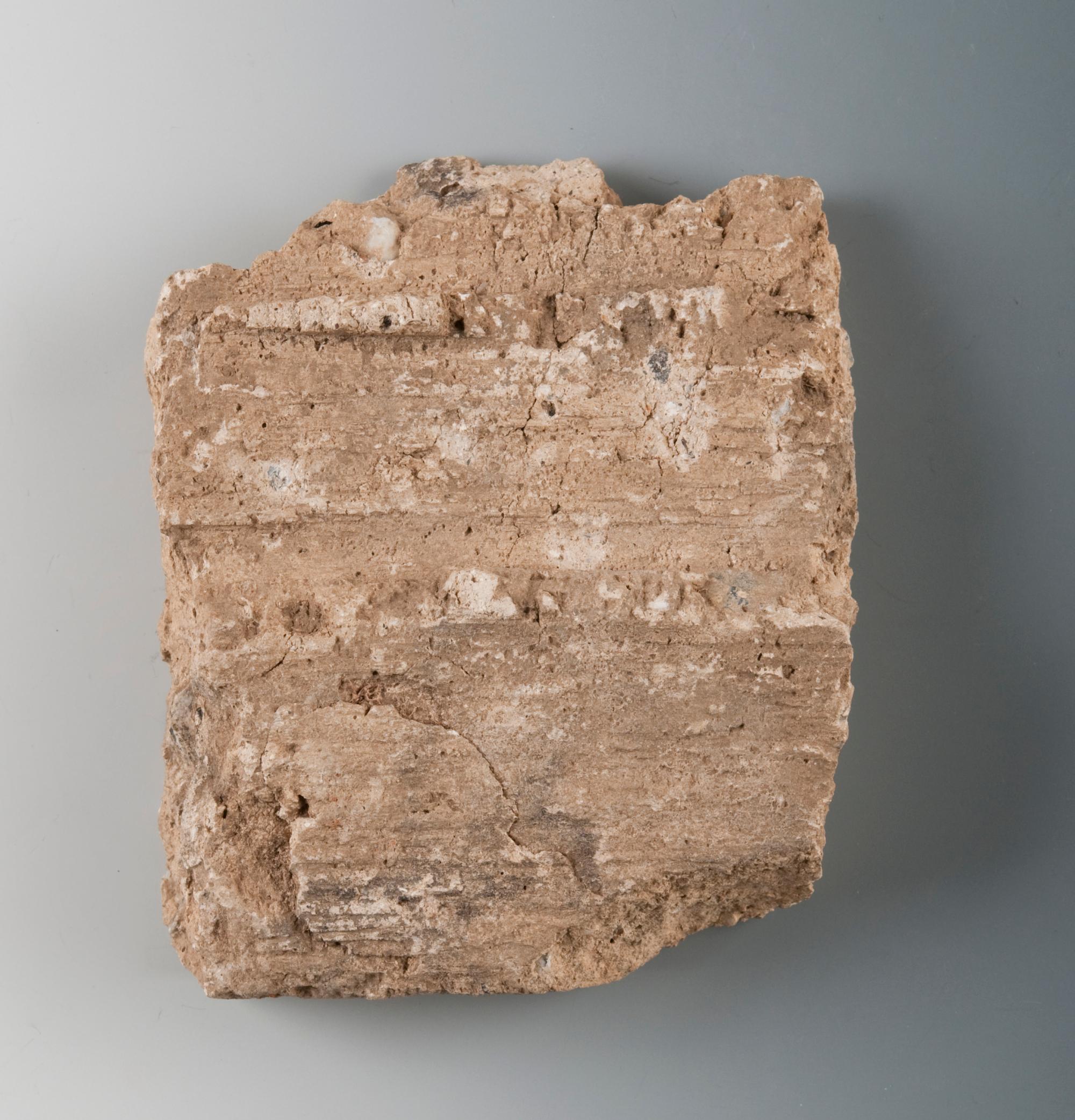 Plaster fragment with flat surface adjacent to finished surface.Plaster ...
